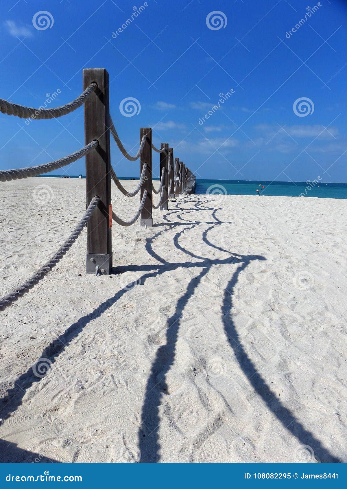 Rope Fence and Shadow on the Beach. Stock Image - Image of climate ...