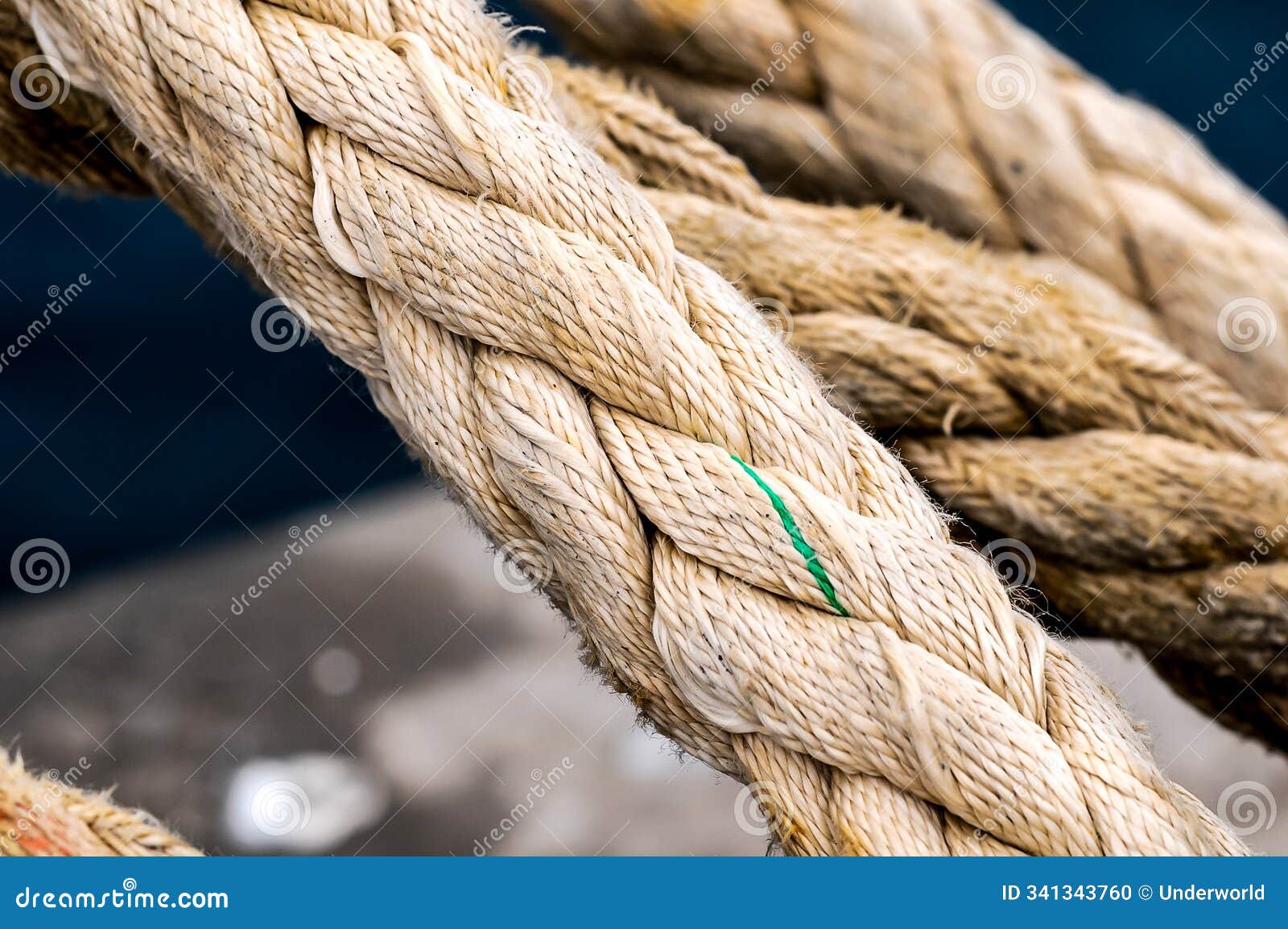 A Rope with a Green Stripe is Shown Stock Photo - Image of knot, green ...