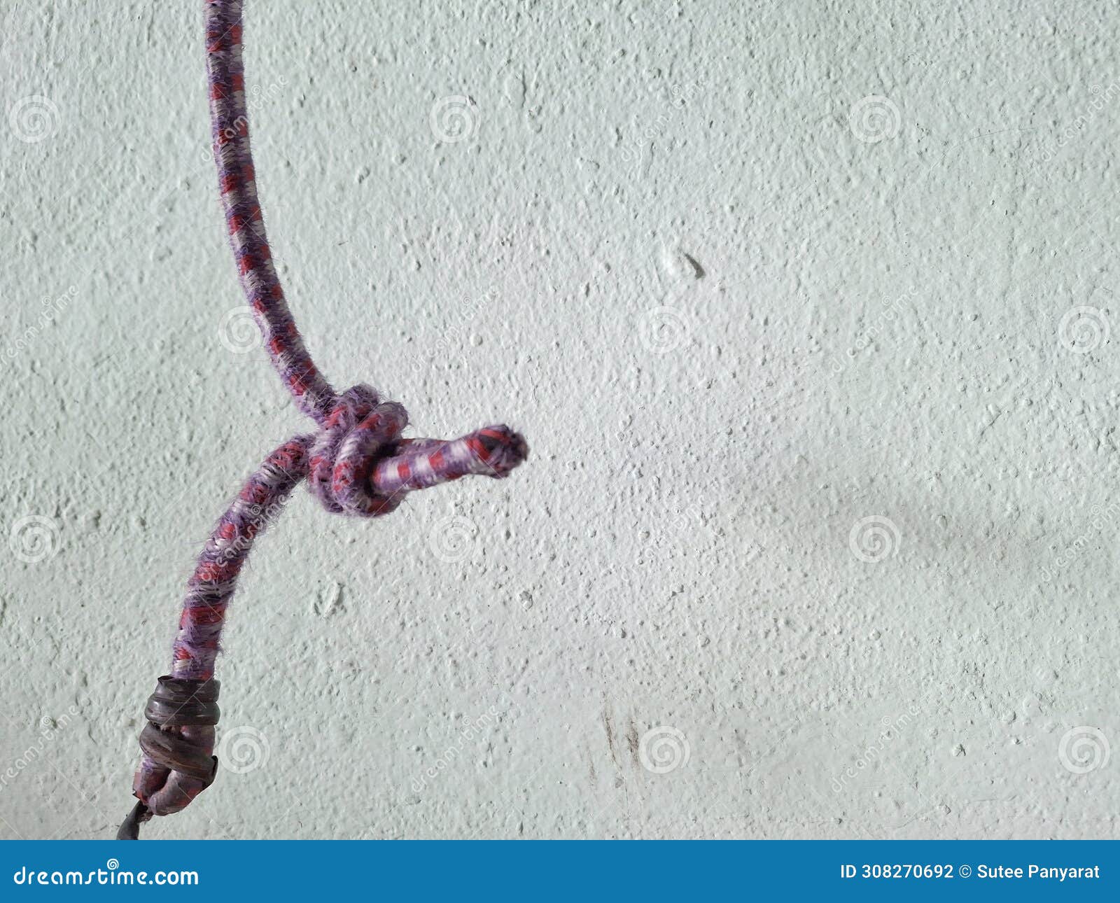 Rope Hanging Down There is a White Wall Behind. Stock Photo - Image of ...