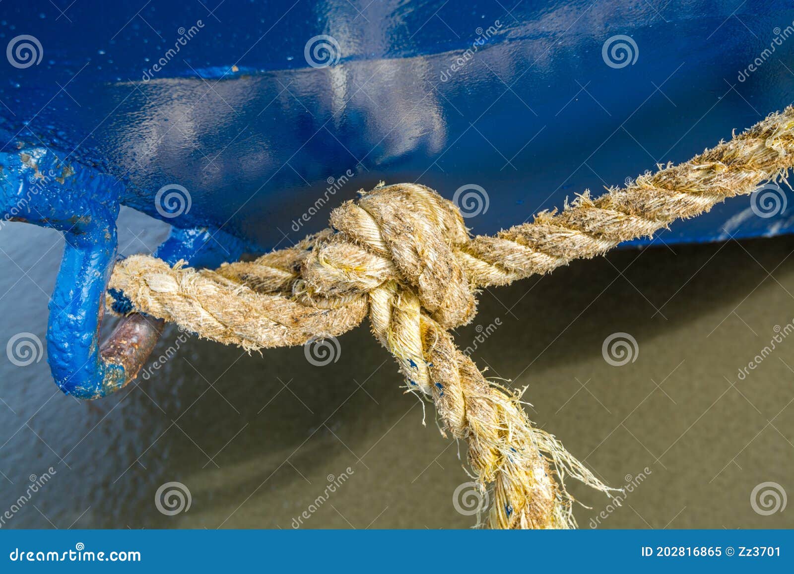 A Rope Knot Hanging on a Blue Boat Stock Image - Image of ship, hanging ...