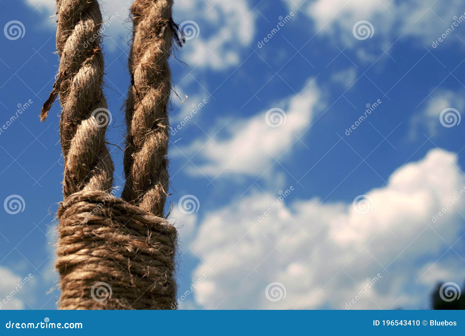 A Rope Loop with a Knot Against a Blue, Overcast Sky Stock Photo ...