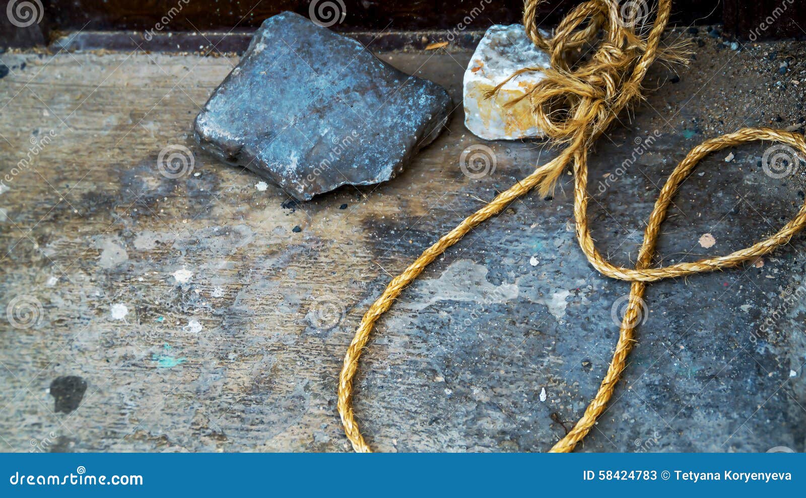 Rope Loop Stone on the Ground Stock Image - Image of protection, gold ...