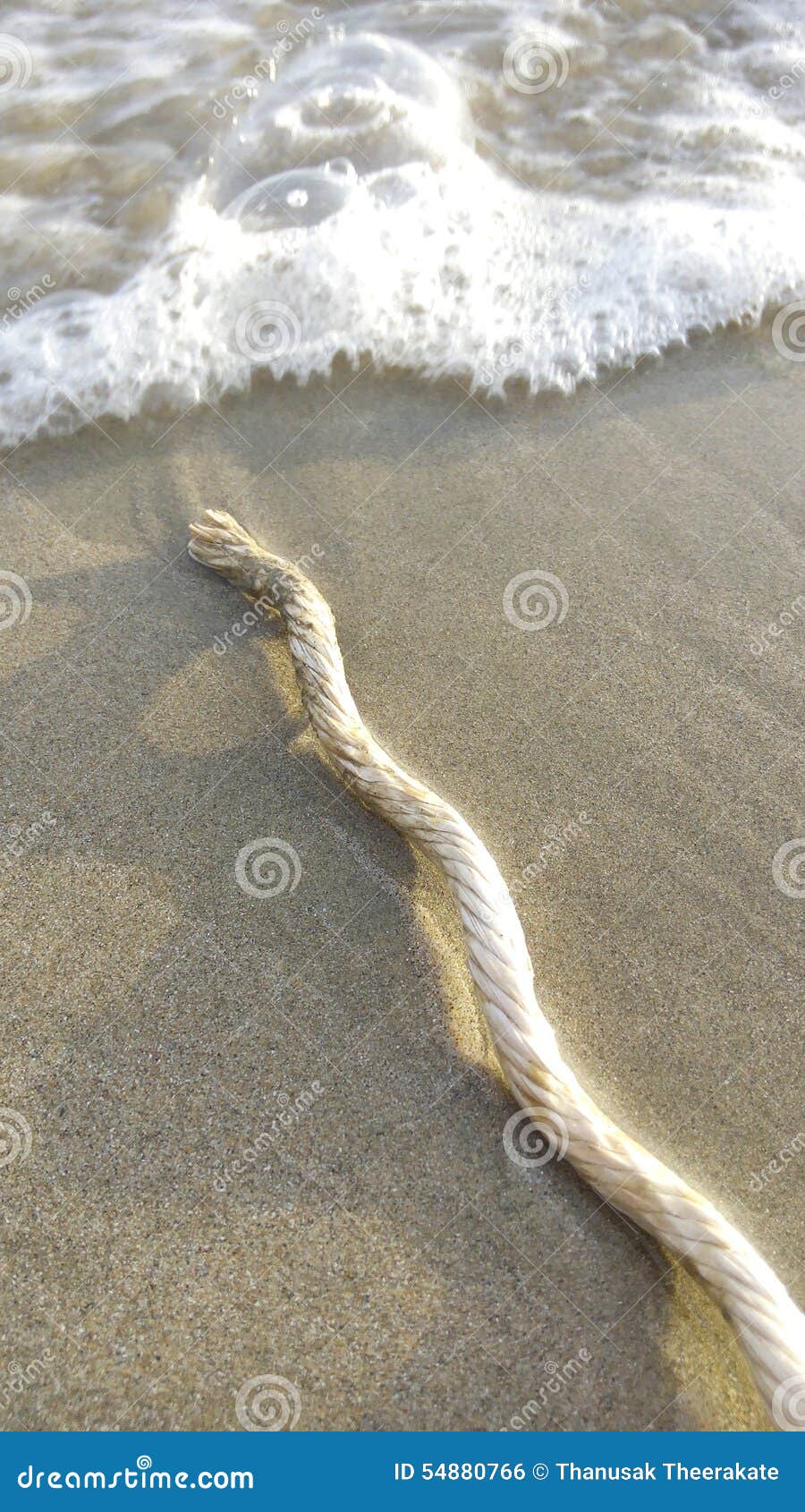 Rope with Ocean Waves on the Beach Stock Photo - Image of abstract ...