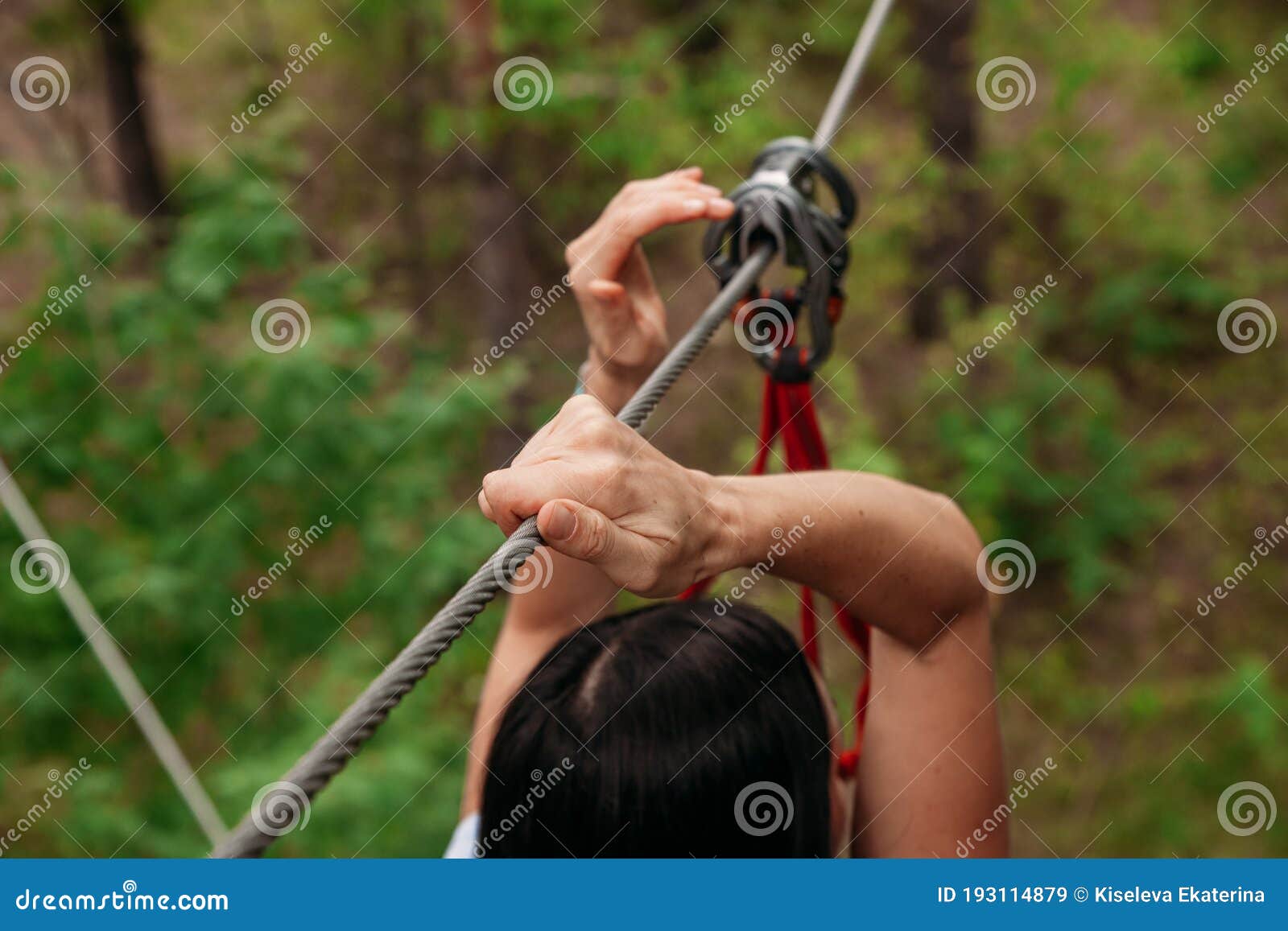 Rope Park. Traveling on the Track Using a Zip Line System, Close-up ...