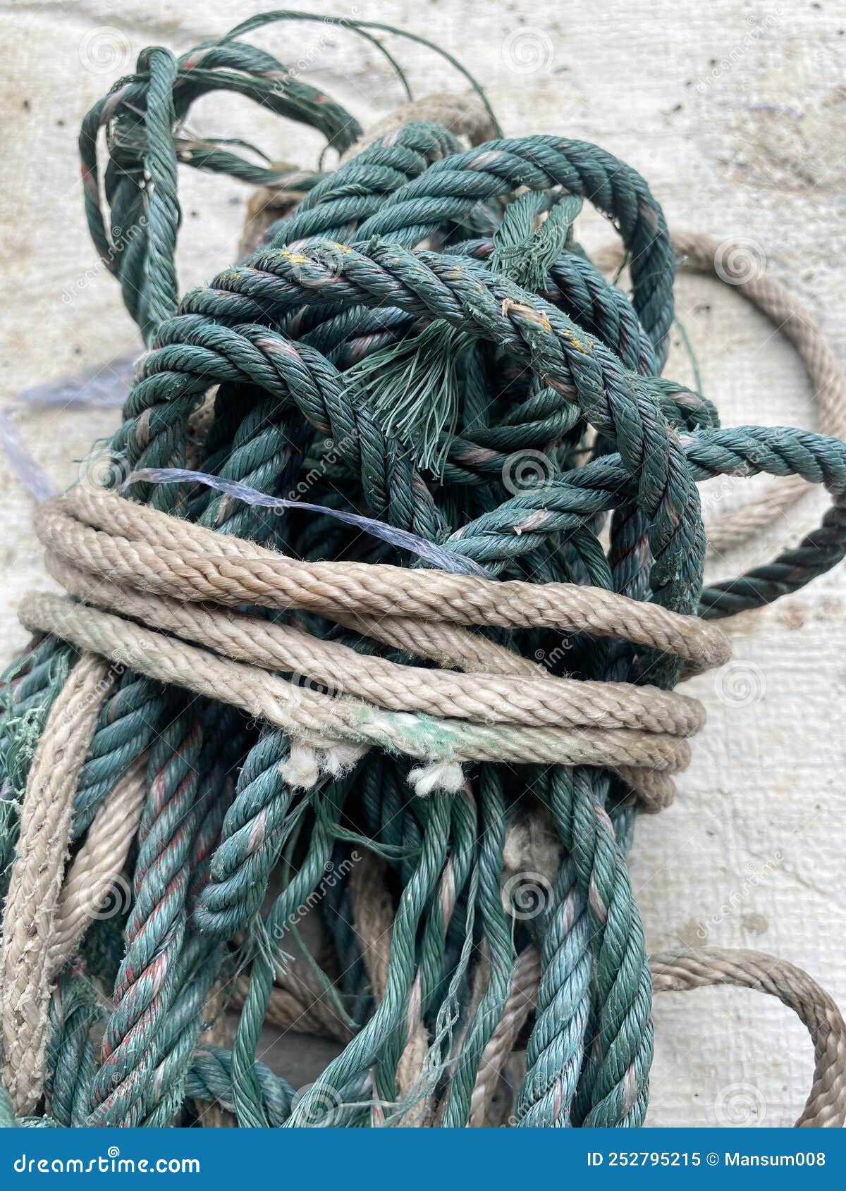 Rope Pile on the ground stock image. Image of spiral - 252795215