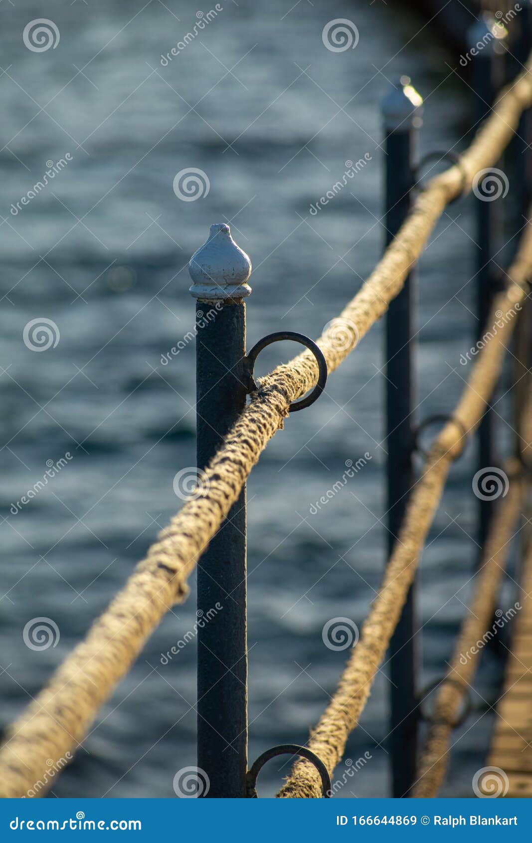Rope Railing of a Landing Stage in the Evening Light. Backlit. Stock ...