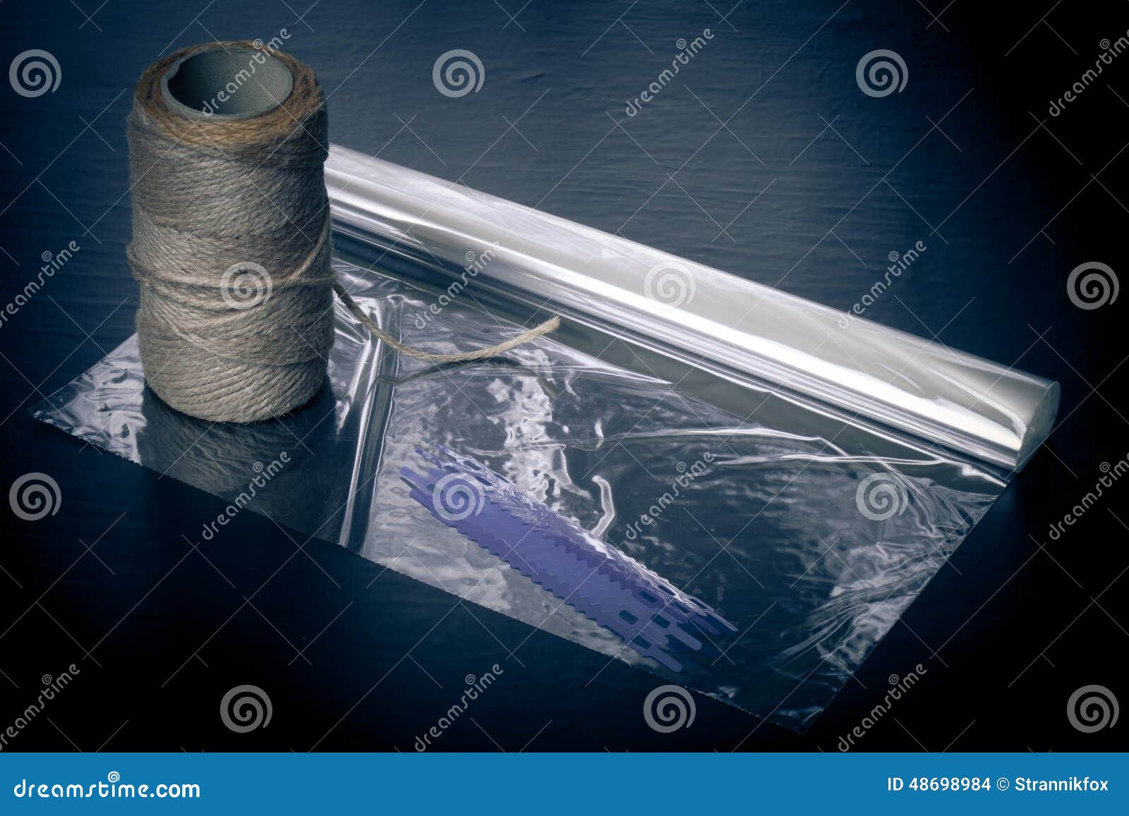 Rope and Set for Roasting Meat on a Black Background Stock Photo ...