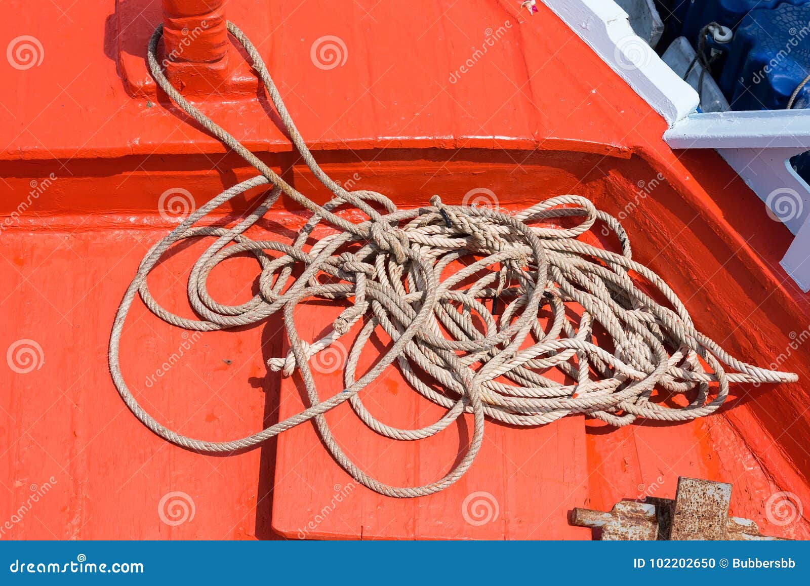 Rope and Small Anchor on Board Ship Deck. Stock Photo - Image of ship ...