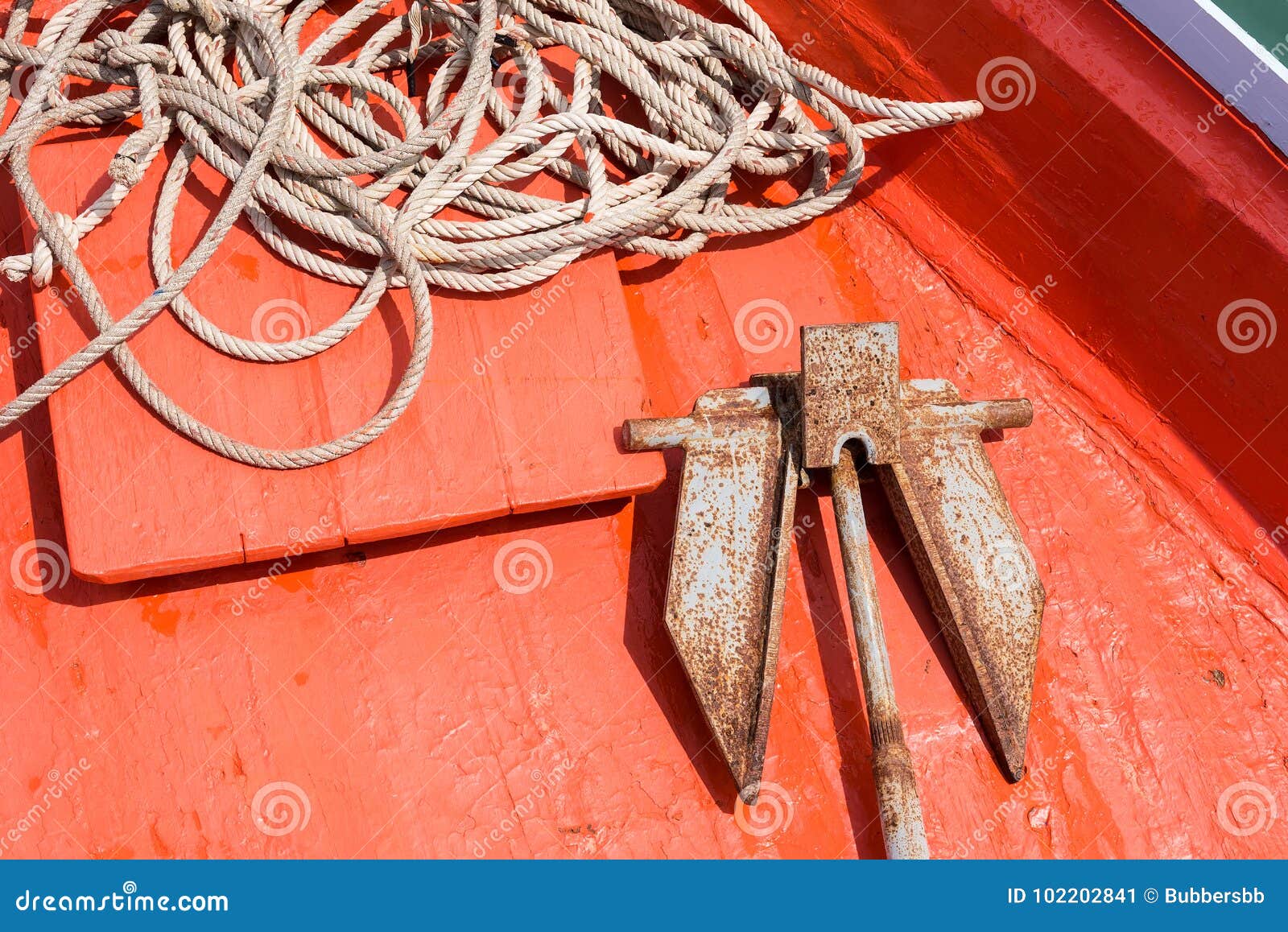 Rope and Small Anchor on Board Ship Deck. Stock Image - Image of ...
