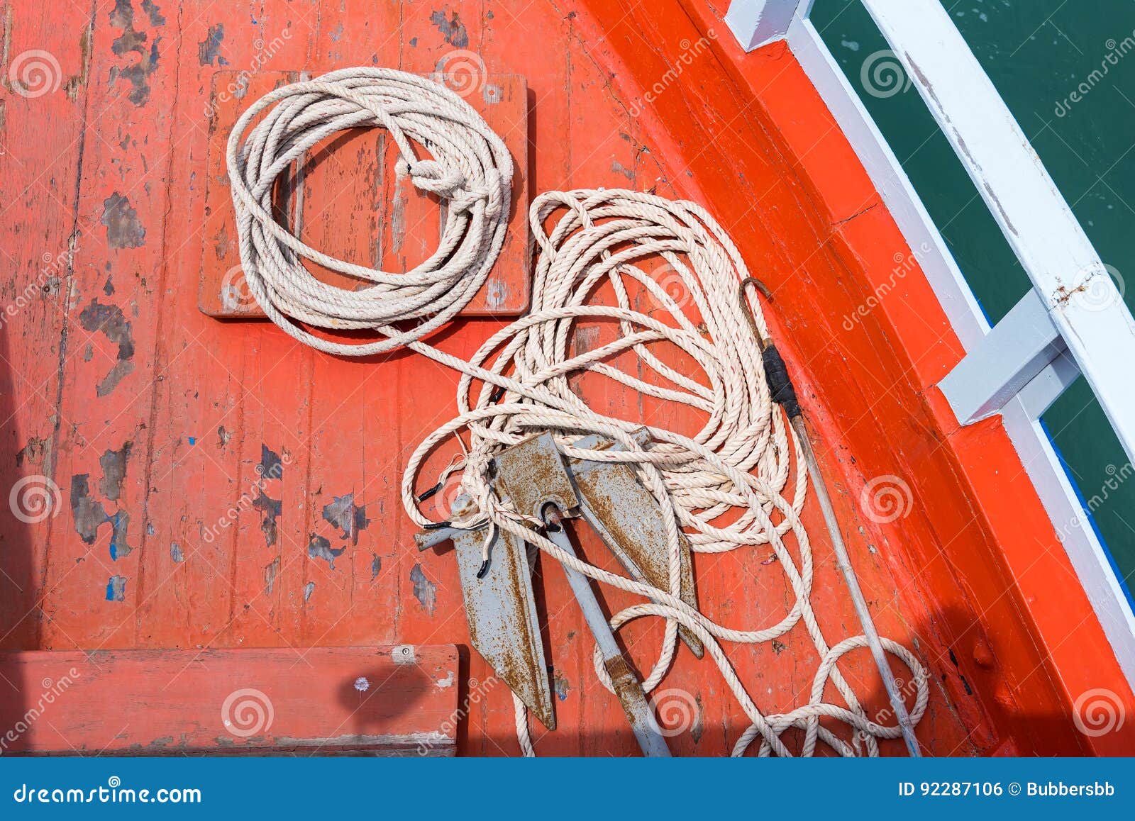 Rope and Small Anchor on Board Ship Deck. Stock Photo - Image of cruise ...