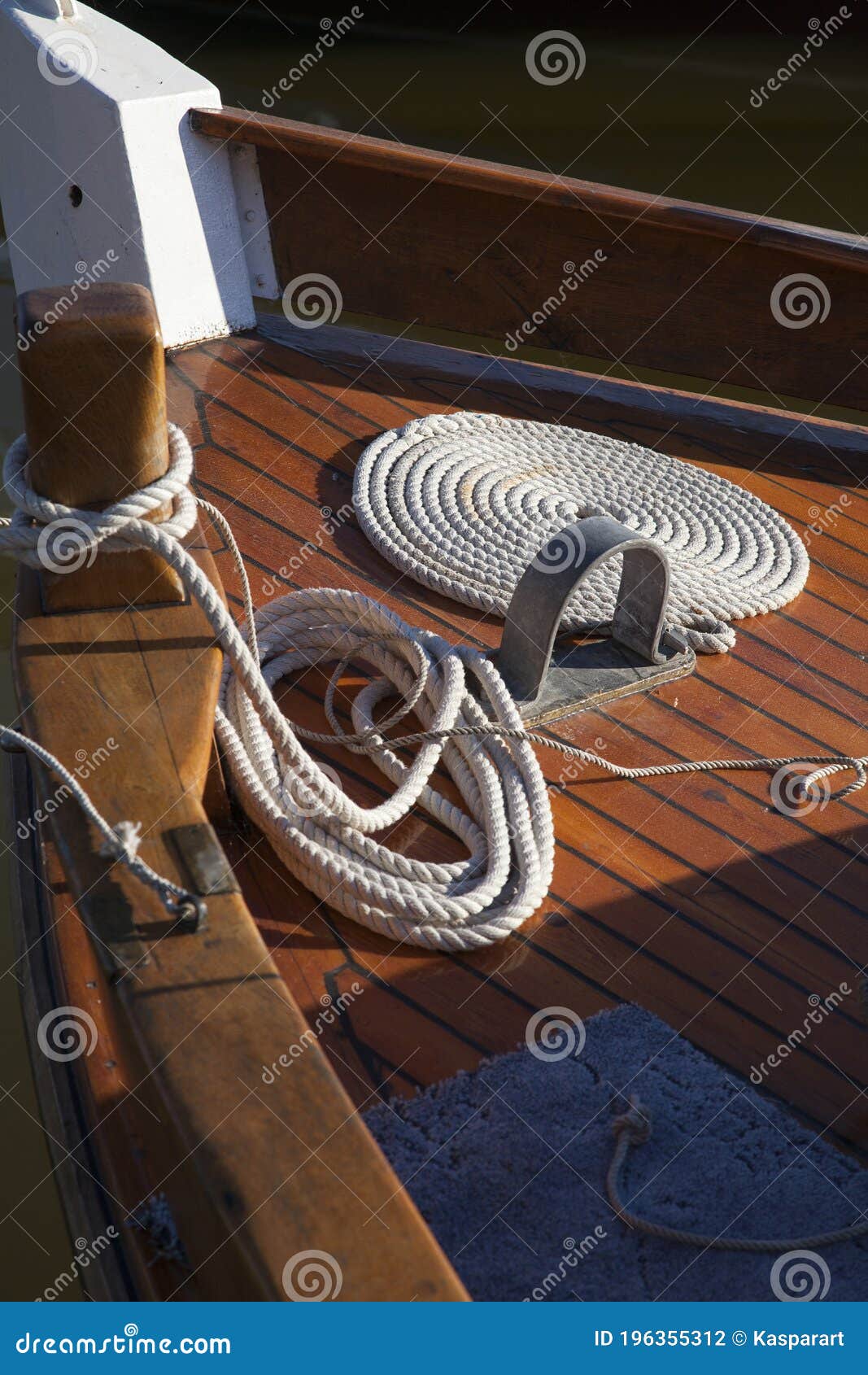 Spiral Ship Rope Lying Down On Dark Brown Deck As Background Texture ...