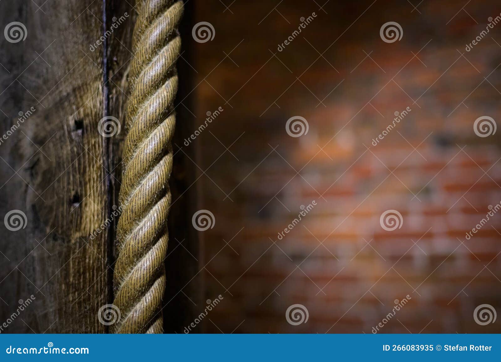 Rope with a Stone Wall Made Out of Bricks in Background Stock Image ...