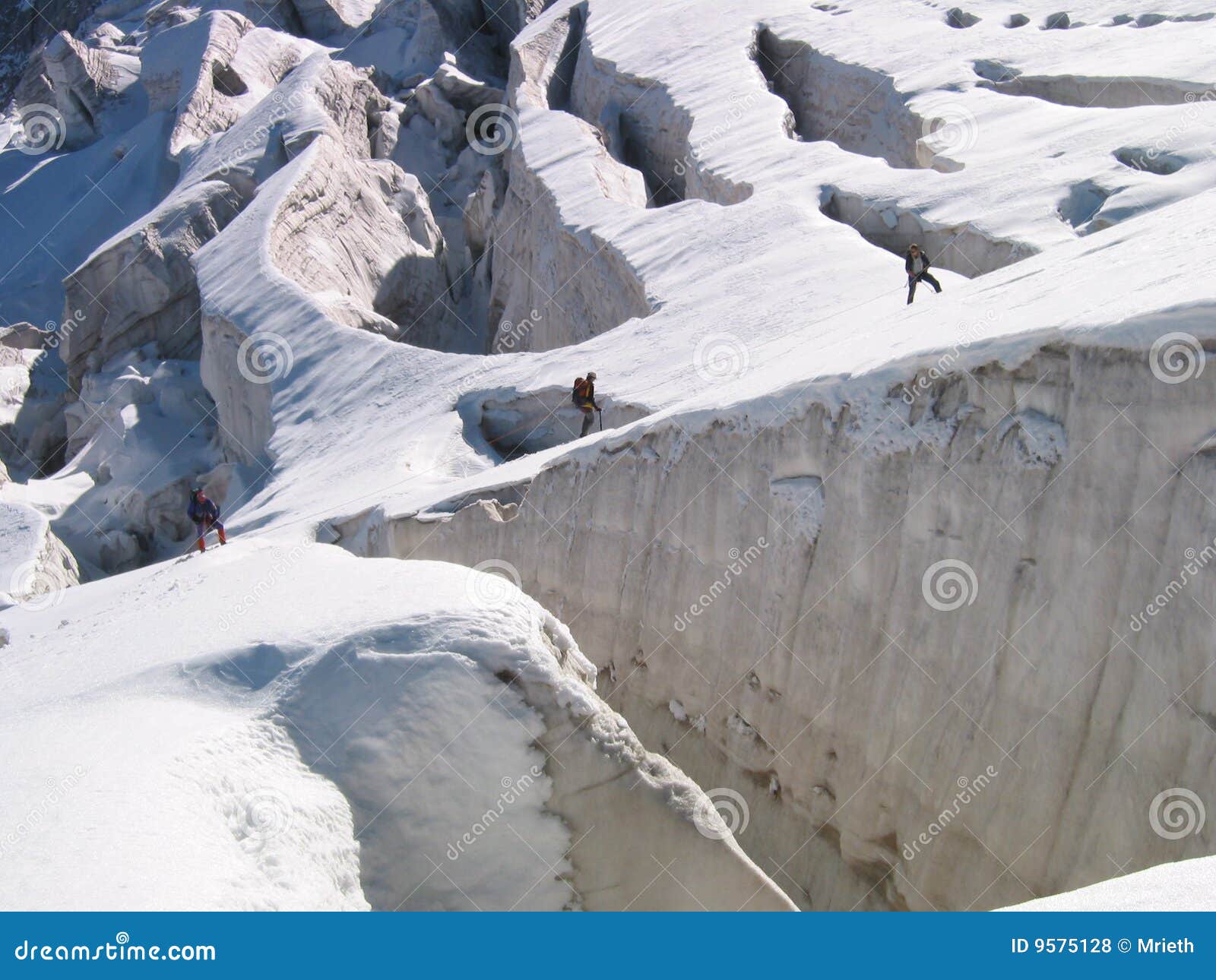 Rope Team in Front of Glacier Crevasses Stock Photo - Image of snow ...