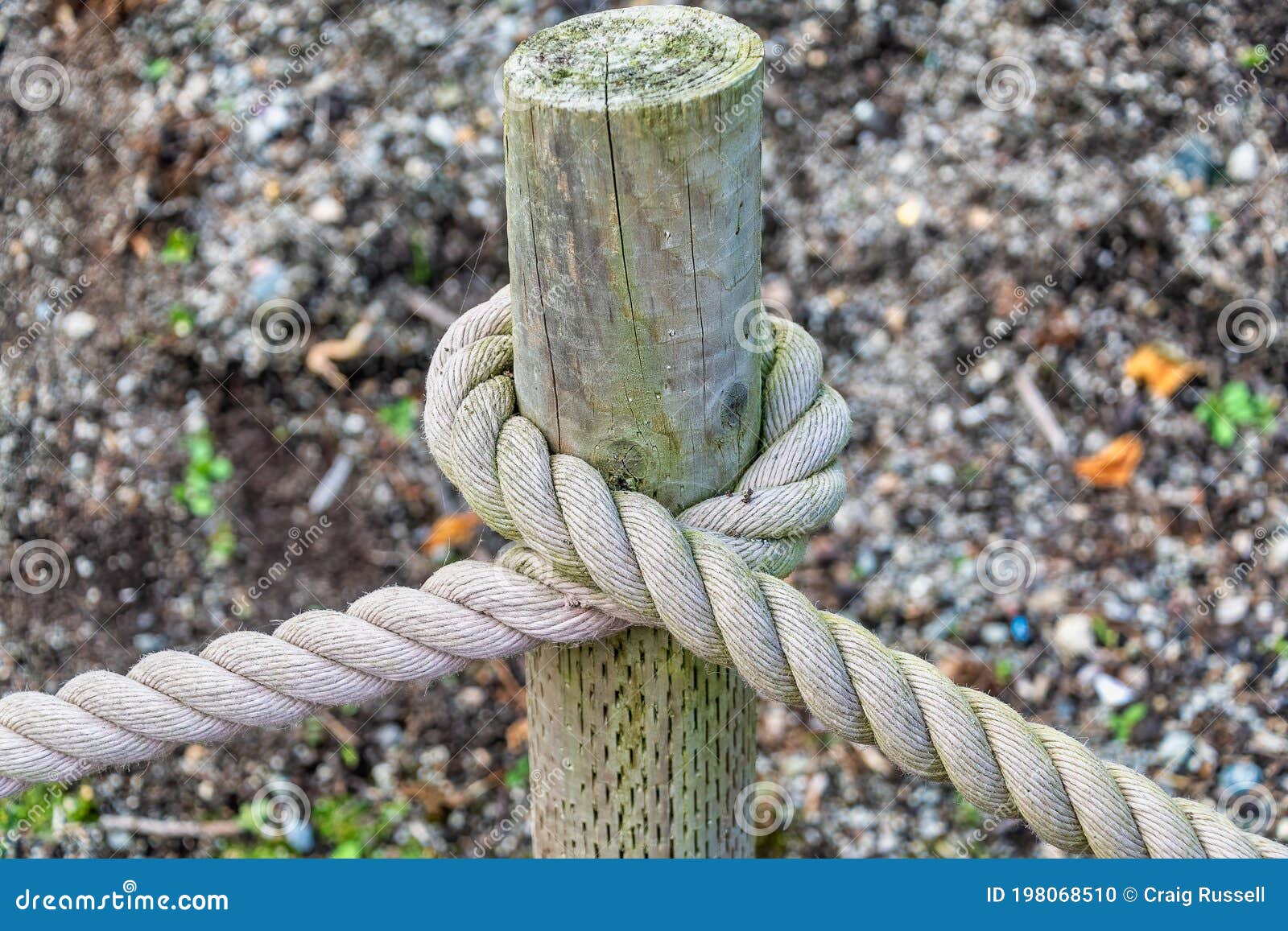 Rope tied around a pole stock photo. Image of material - 198068510