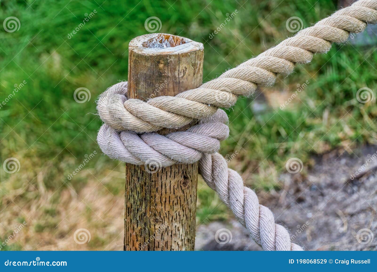 Rope tied around a pole stock image. Image of background - 198068529