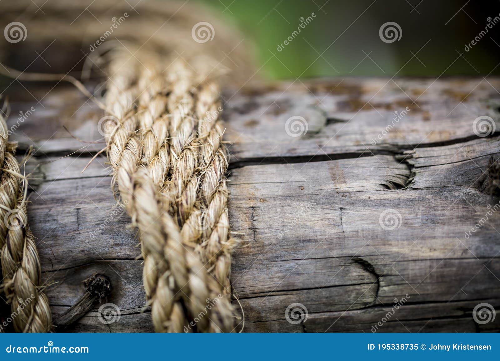 Rope tied around wood stock image. Image of knot, pattern - 195338735