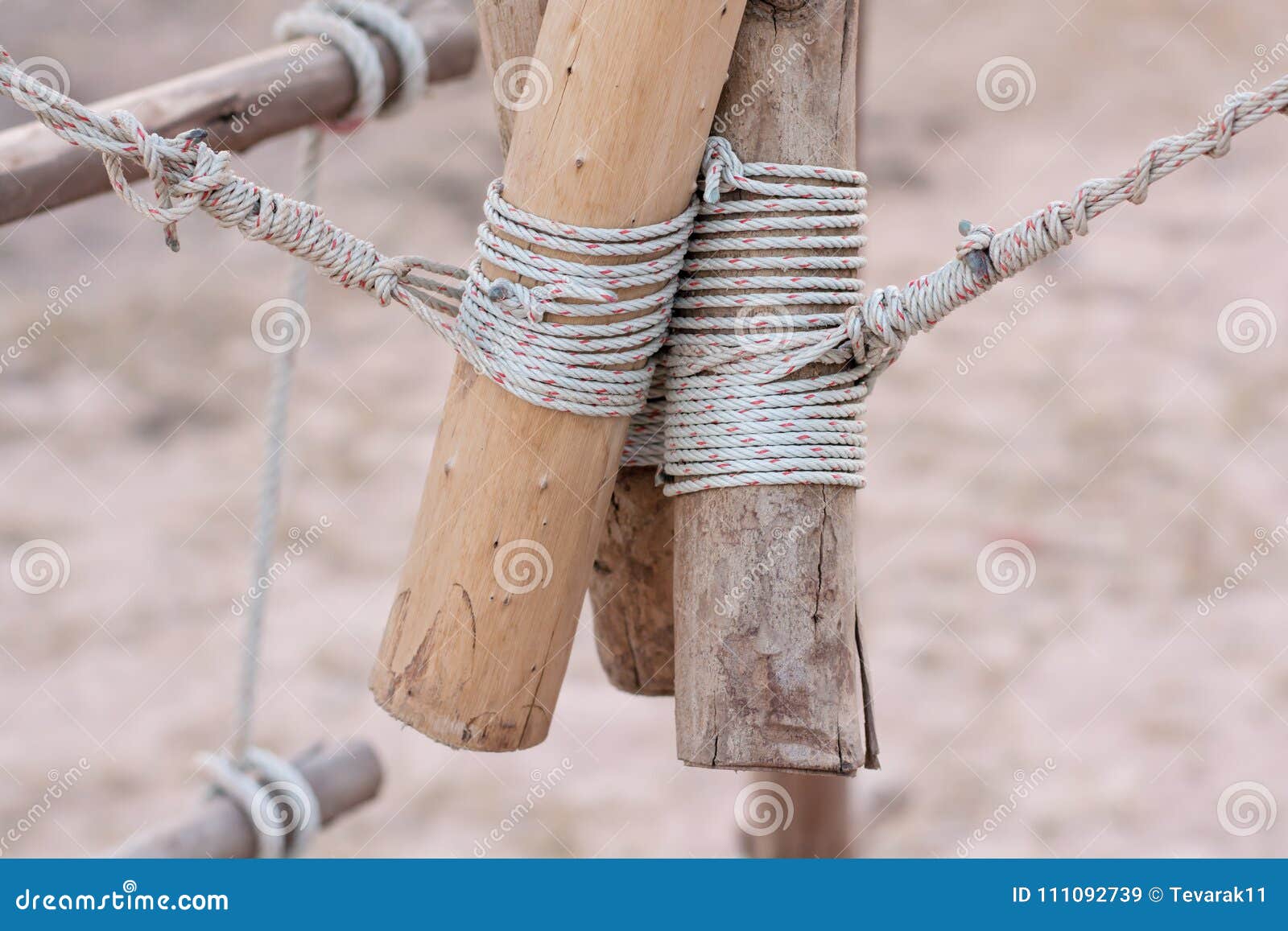 A Rope is Tied in a Knot Around a Fence Post , Rope Tied Knot Wood Pole ... A Rope is Tied in a Knot Around a Fence Post , Rope Tied Knot Wood Pole ...