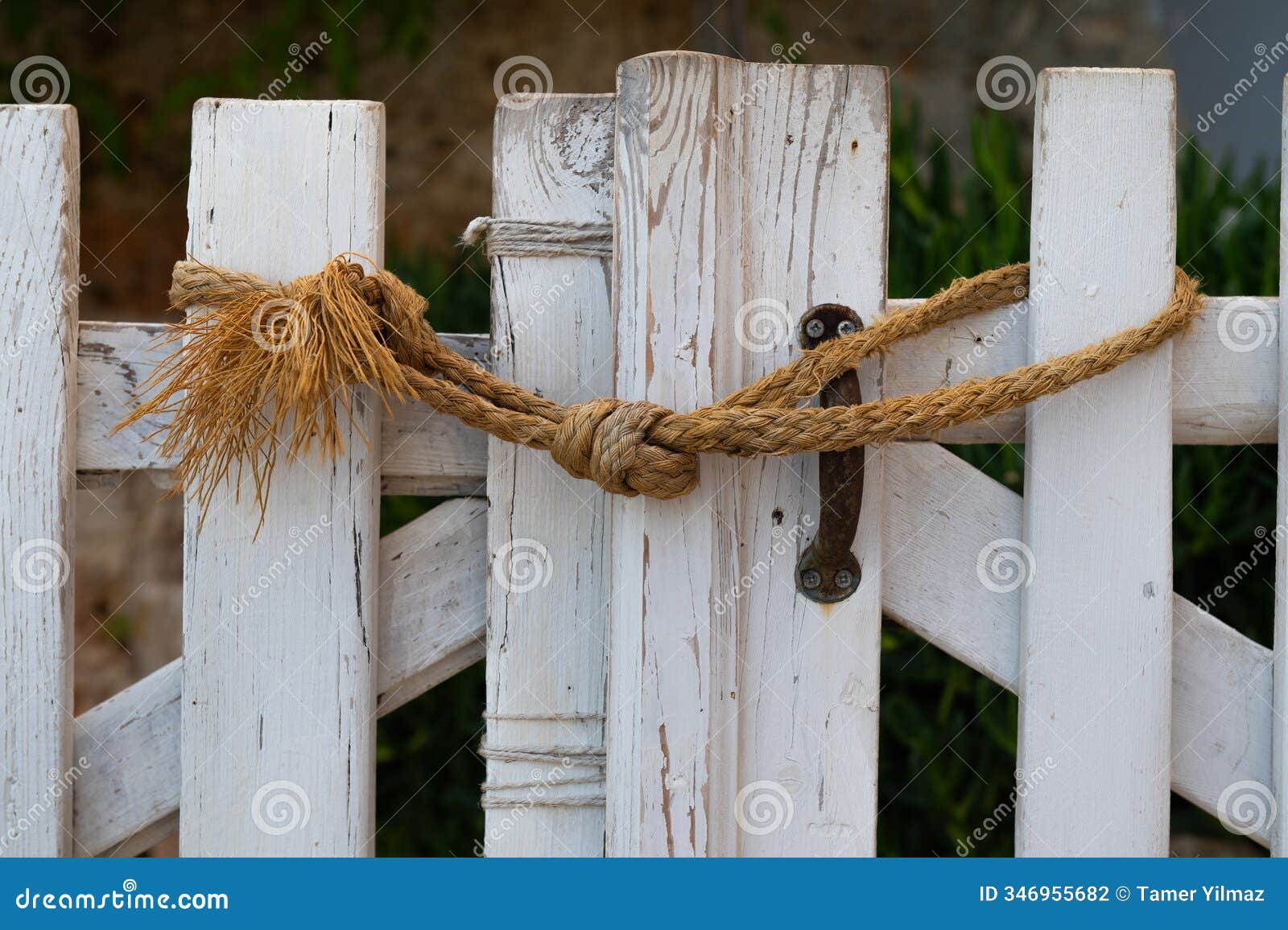 Rope Tied To the Garden Gate Stock Photo - Image of bamboo, grunge ...