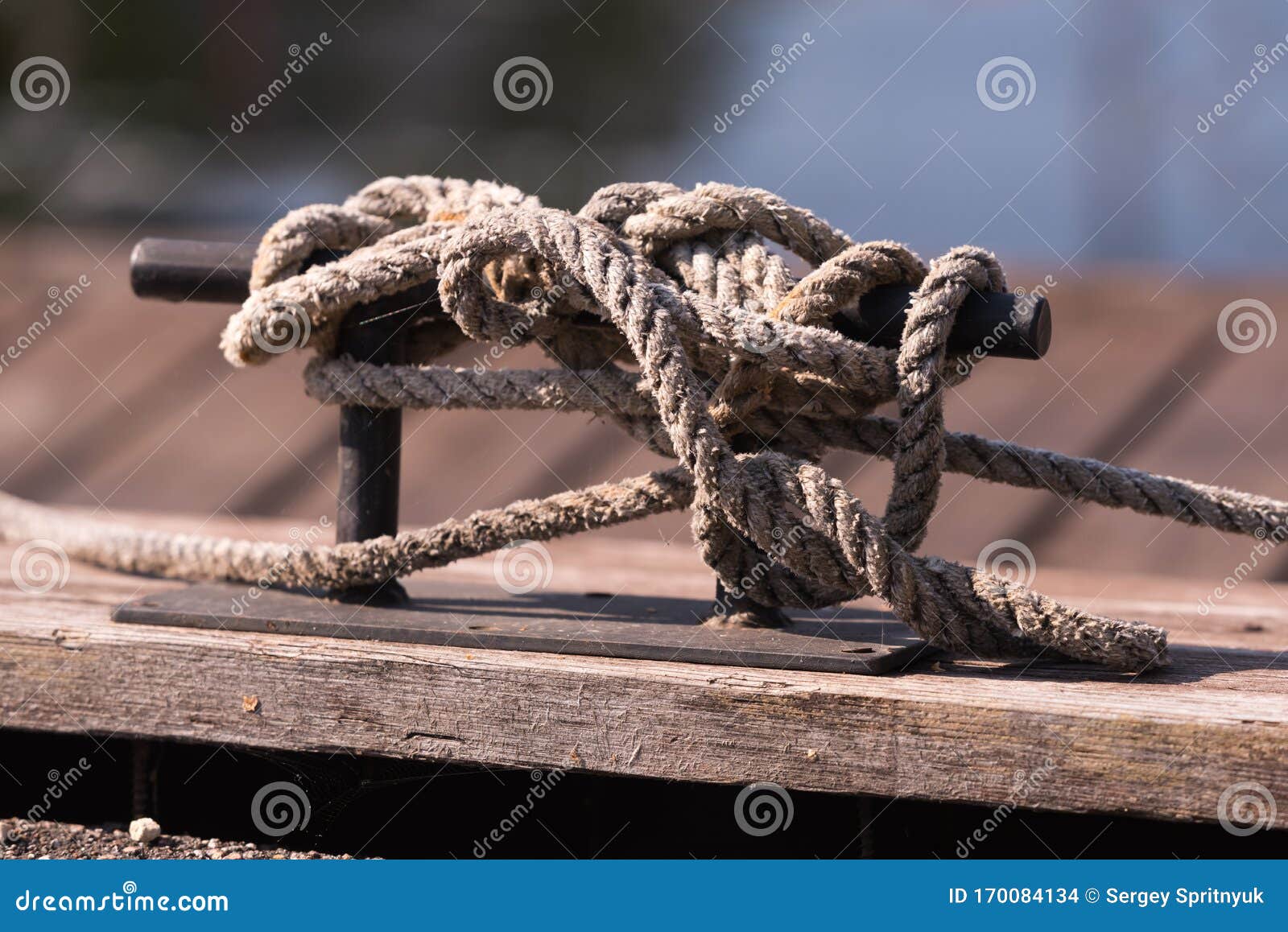 The Rope Wound on the Cross Cleat on the Pier Stock Photo - Image of ...