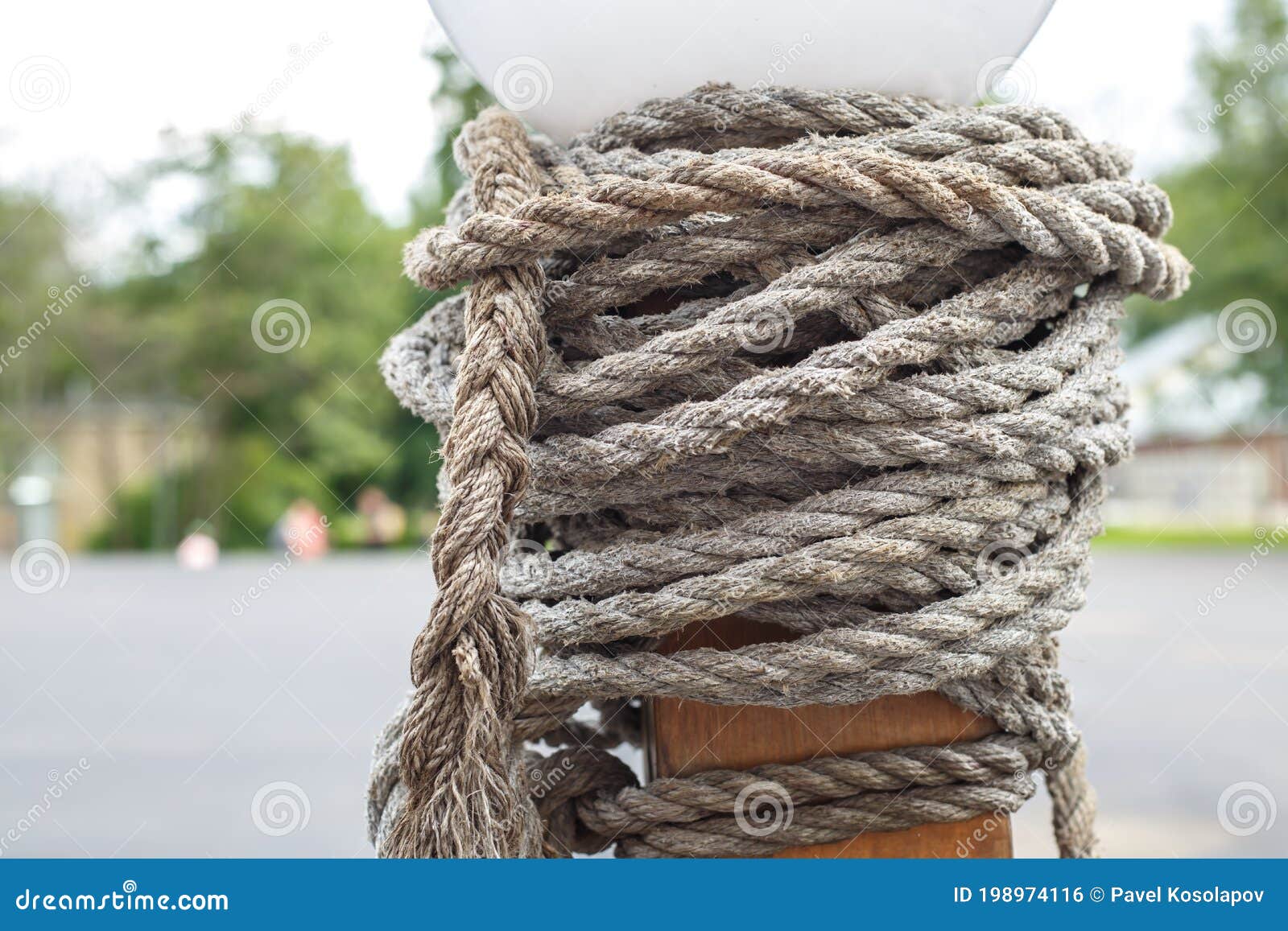 A Rope Wrapped Around a Pole. Stock Photo - Image of safety, brownish ...