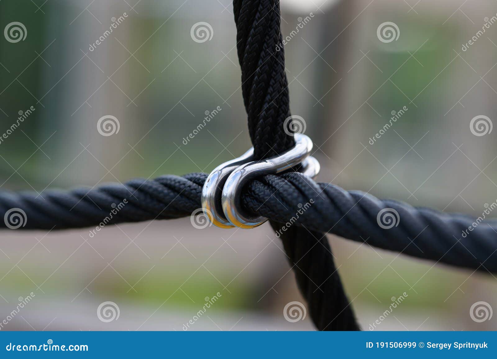 Ropes Bound Together with Metal Attachments on a Playground Stock Image ...