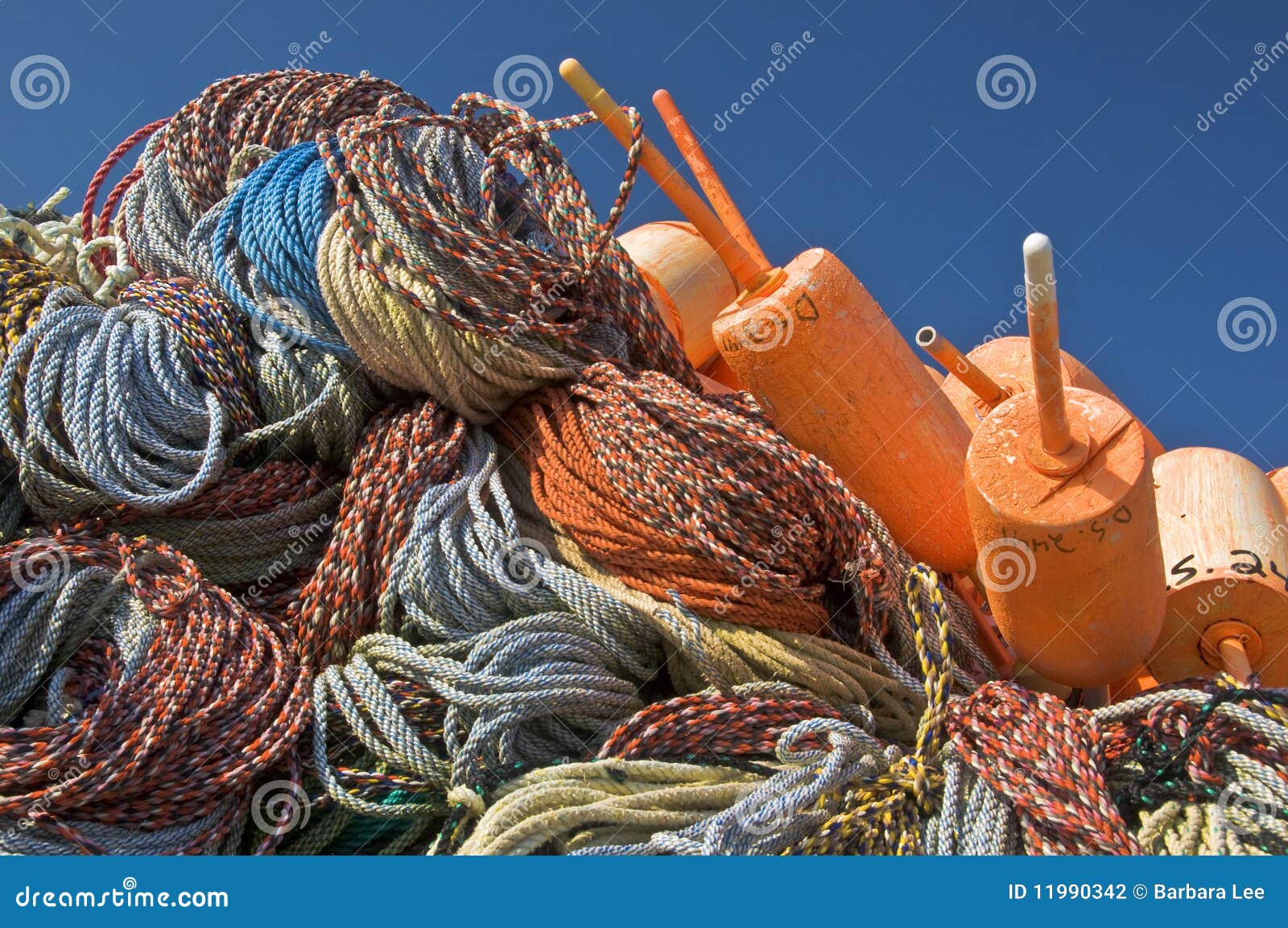 Ropes and Buoys stock photo. Image of blue, stack, pile - 11990342