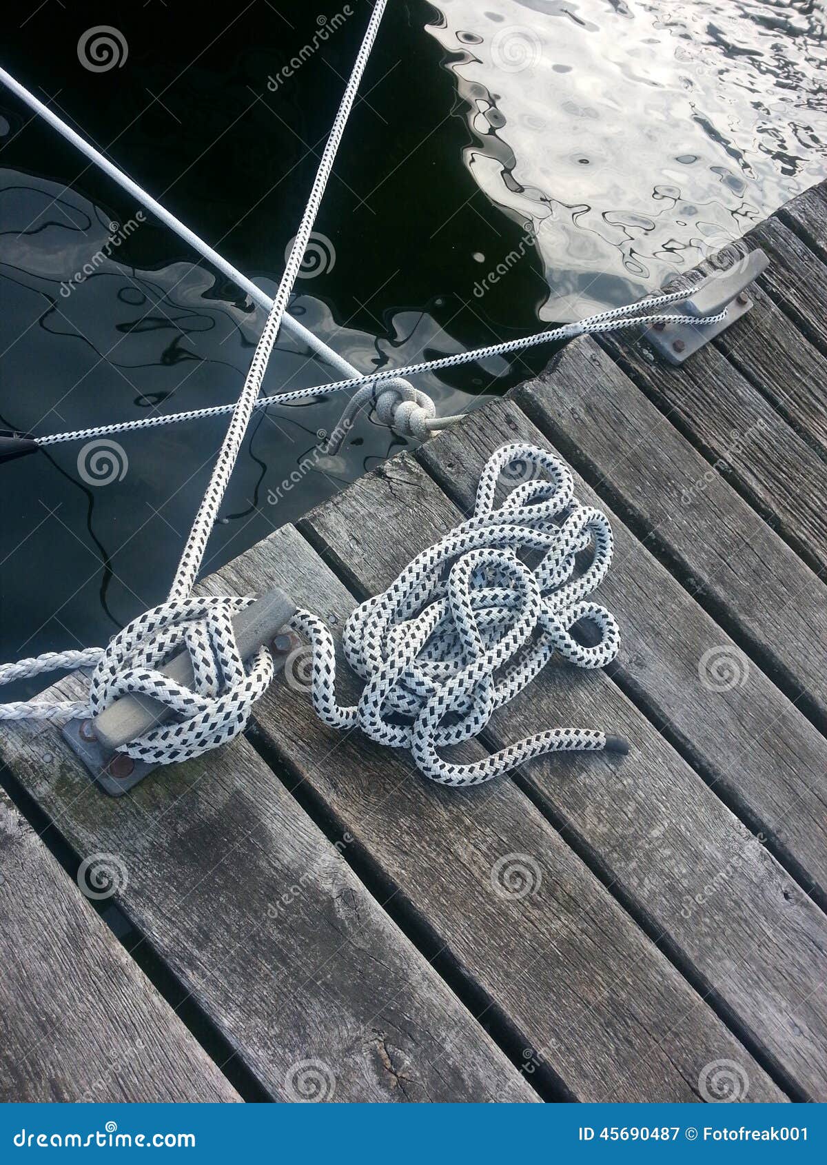 Ropes on pier stock image. Image of pier, maritime, landing - 45690487