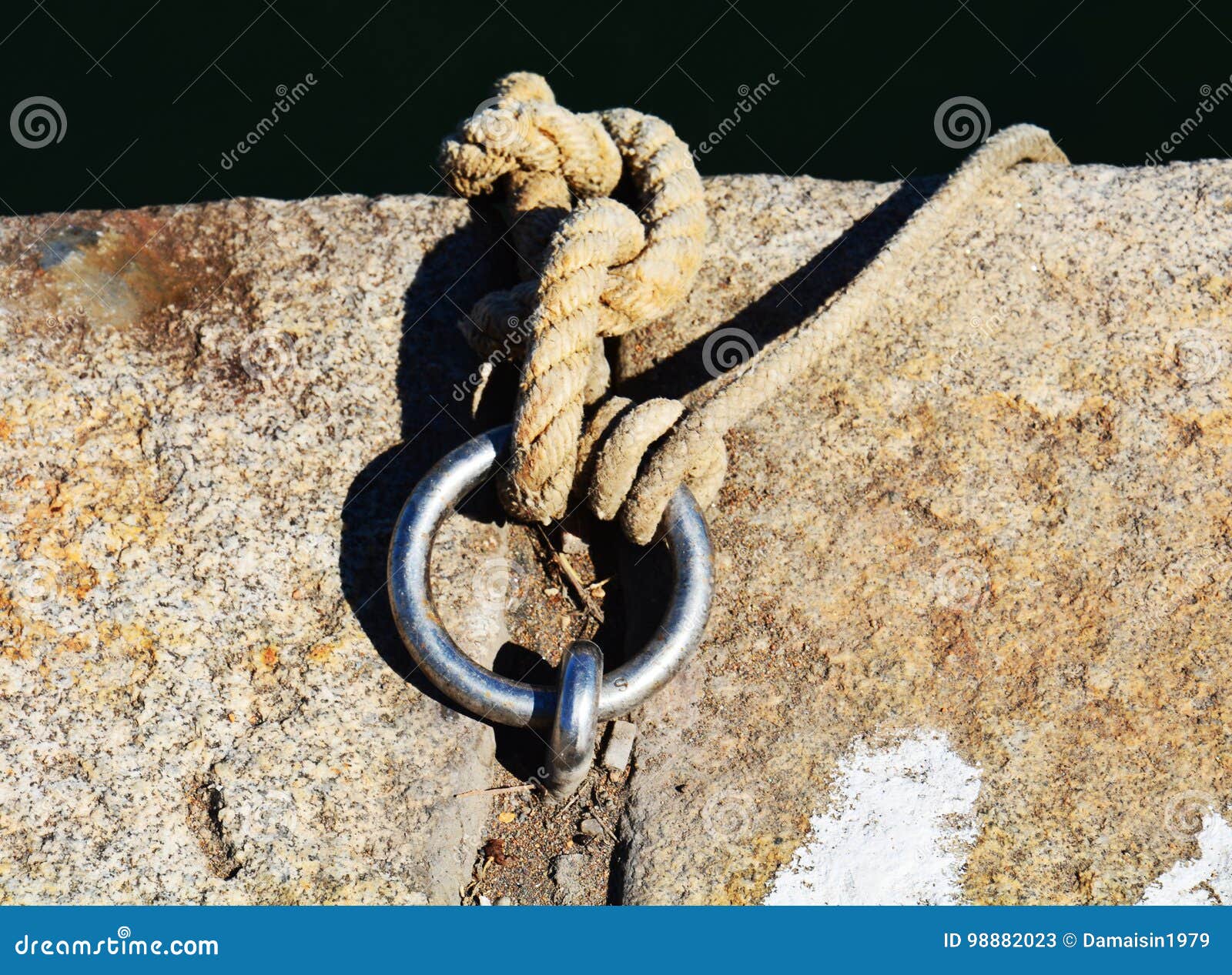 Ropes and ring for ships stock image. Image of rock, ring - 98882023