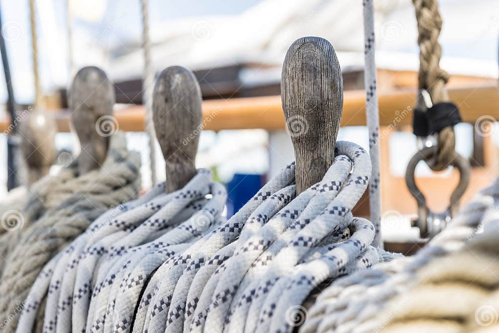 Ropes tied on a ship deck. stock image. Image of maritime - 61294409