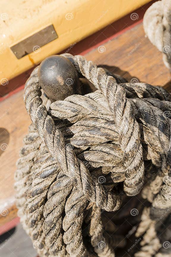 Ropes tied on a ship deck. stock photo. Image of ropes - 61296028