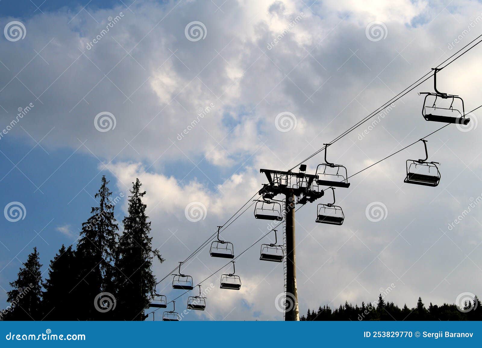 Ropeway Silhouette with Empty Seats Above Trees Stock Photo - Image of ...
