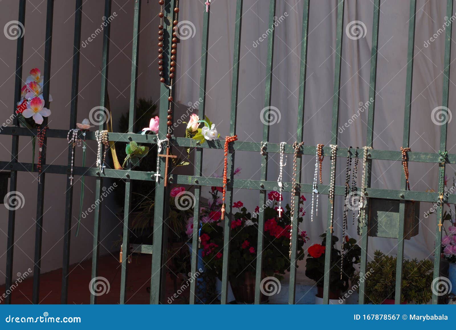 Rosary, on a gate stock image. Image of traditional - 167878567
