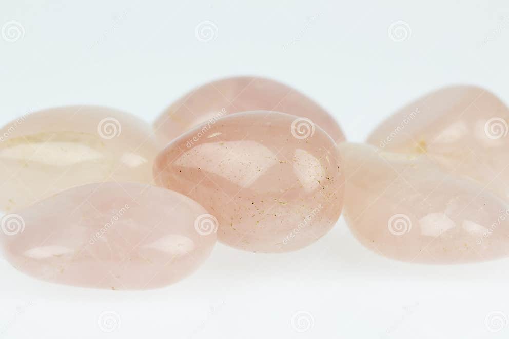 Rose Quartz on White Background Stock Photo - Image of pebble ...