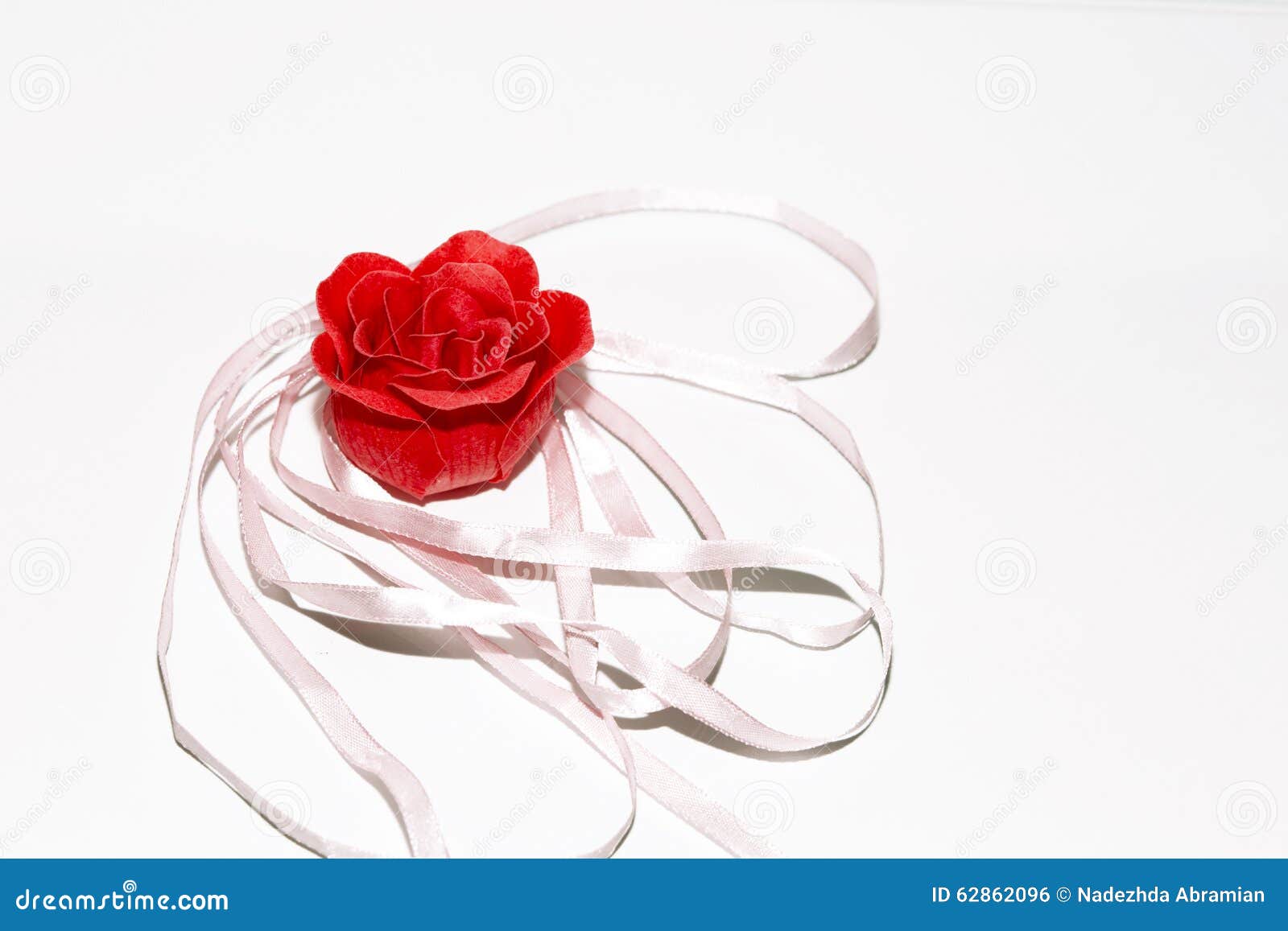Rose with Ribbon on a White Background. Stock Photo - Image of thread ...