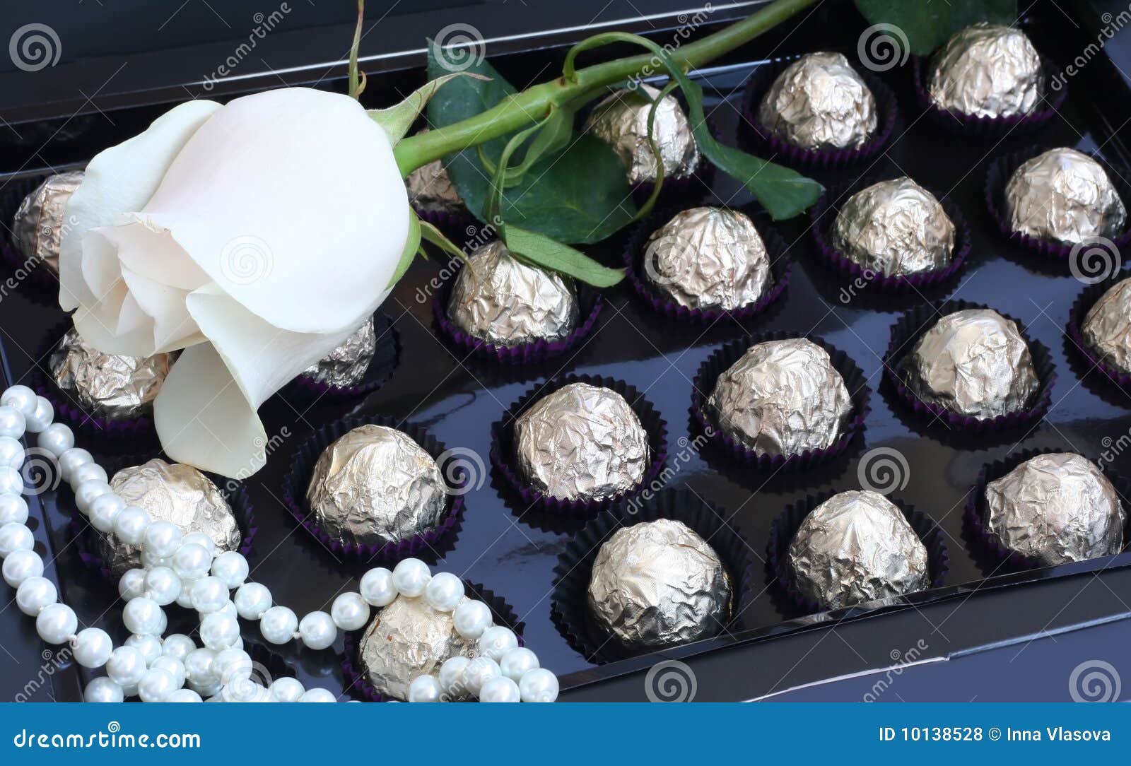 Rose, sweets and pearl stock photo. Image of chocolates - 10138528