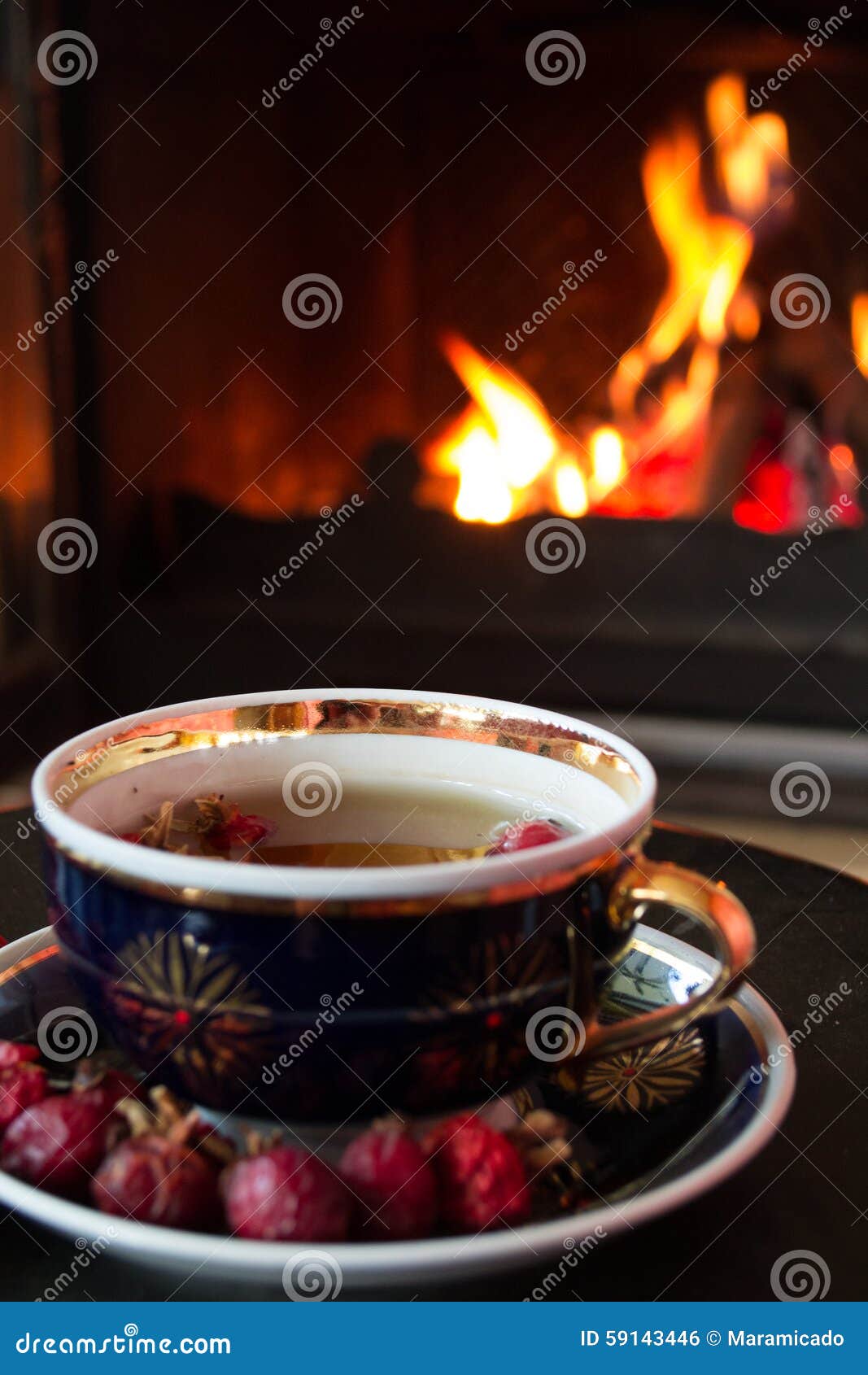Rosehip Tea in Front of Roaring Fire in a Fire Place Stock Photo ...