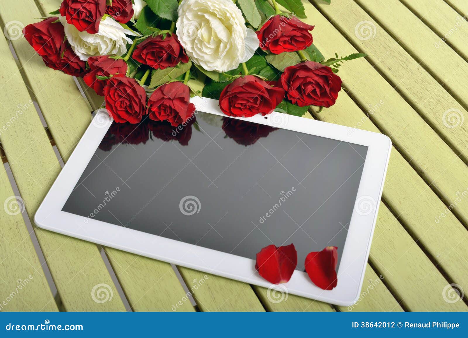 Roses and tablet stock photo. Image of festive, bouquet - 38642012
