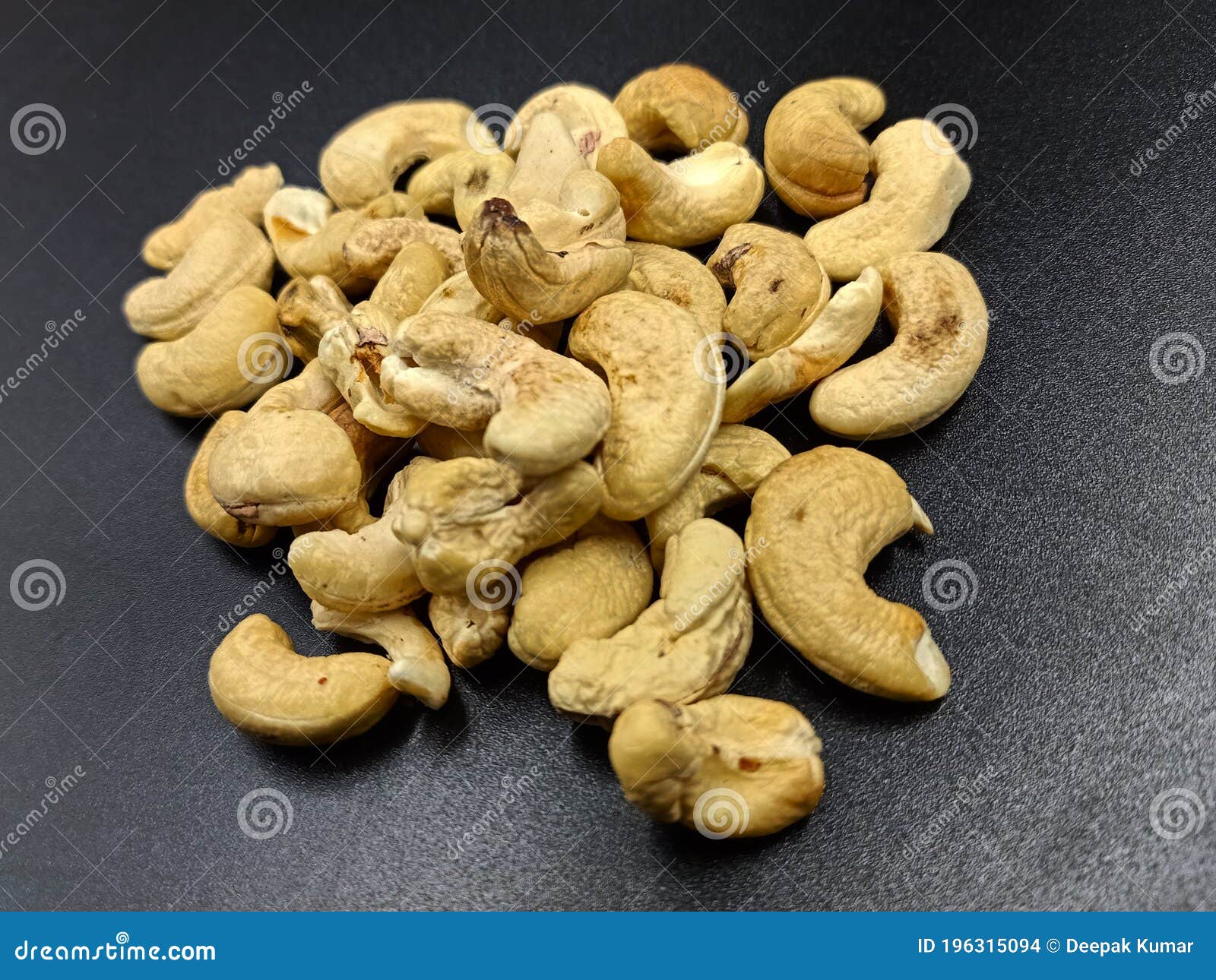 Rosted Cashew on Black Textures Background Stock Photo - Image of ...