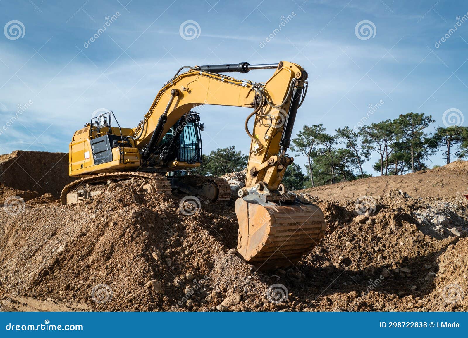 Rotary Backhoe Excavating the Earth Stock Photo - Image of structure ...