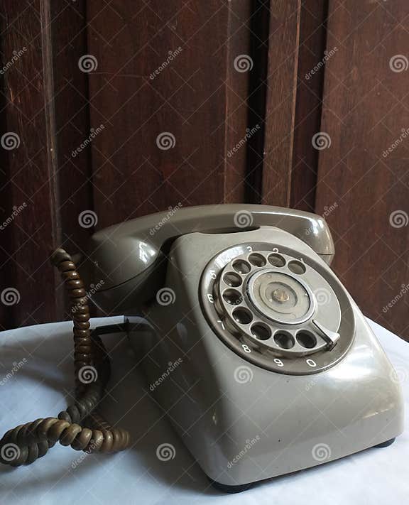 Rotary dial grey telephone stock photo. Image of iron - 291702840