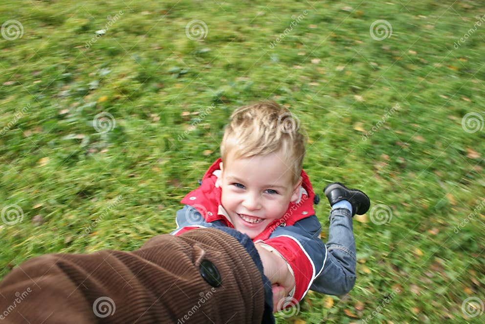 Rotate son stock photo. Image of daddy, motion, closeup - 1346508
