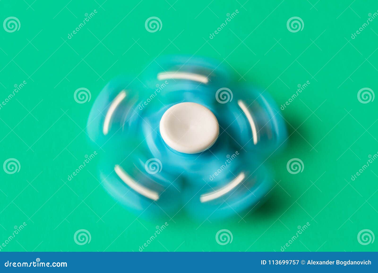 Rotating Blue Spinner . on Turquoise Background Stock Image - Image of ...