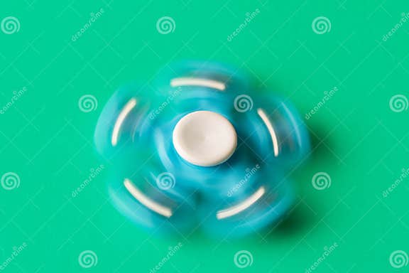 Rotating Blue Spinner . on Turquoise Background Stock Image - Image of ...