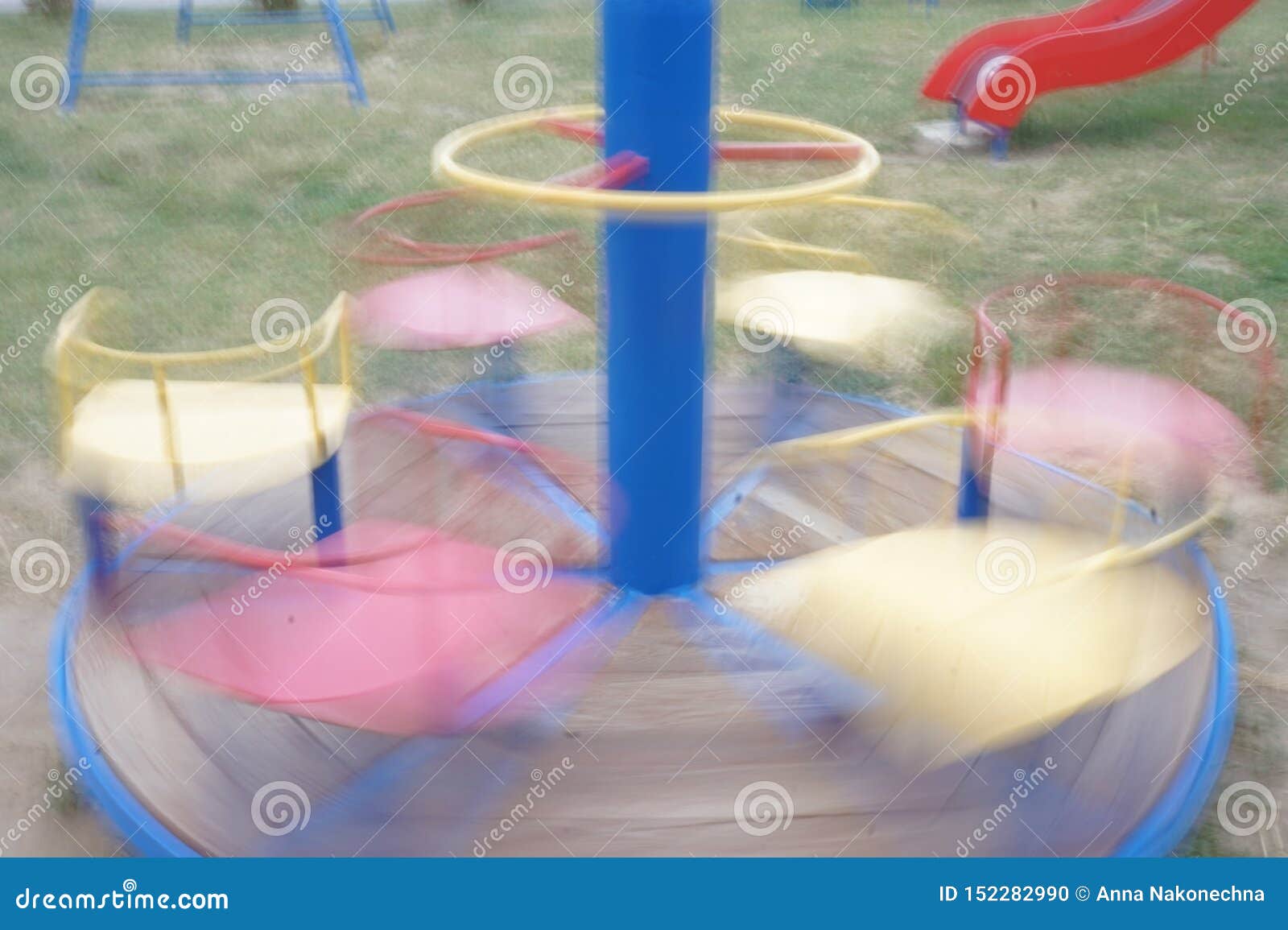 Rotating Carousel on the Playground. Stock Photo - Image of background ...