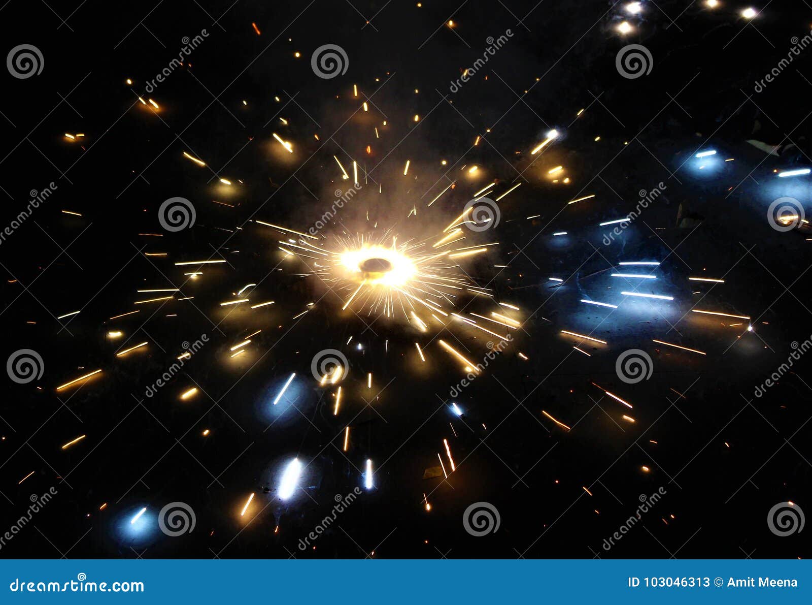 A Ground Rotating Firecracker Stock Image - Image of rotating, blue ...