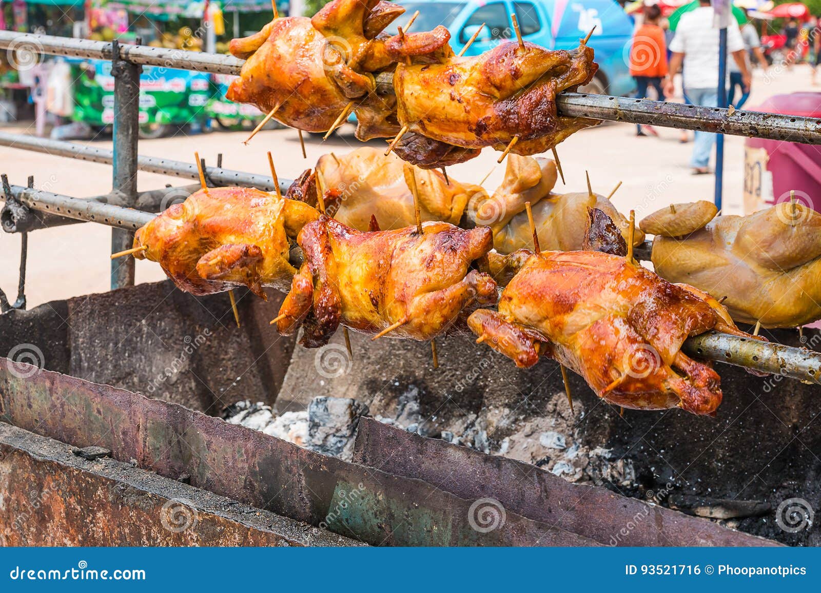 Rotating chicken stock photo. Image of grill, brochette - 93521716