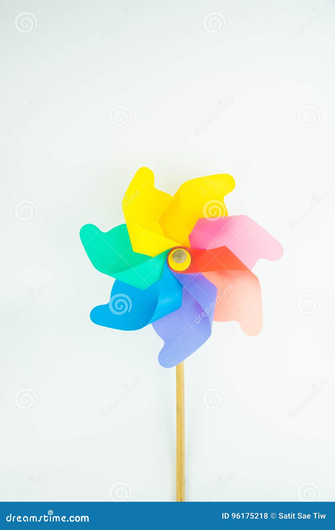Rotating Colorful Pinwheel on the Beach Background. Stock Photo - Image ...