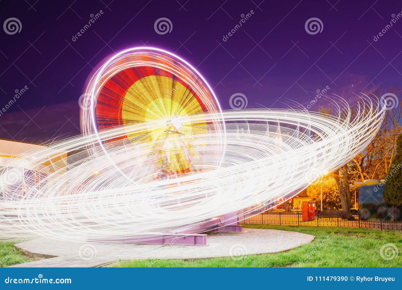 Rotating in Motion Effect Illuminated Attraction Ferris Wheel on Summer ...