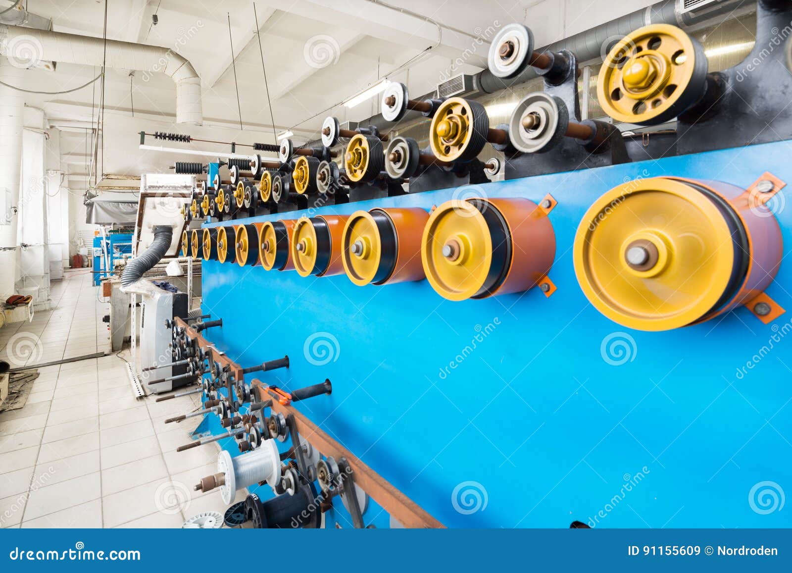 Rotating Rubberized Wheels of the Winding Machine. Stock Image - Image ...