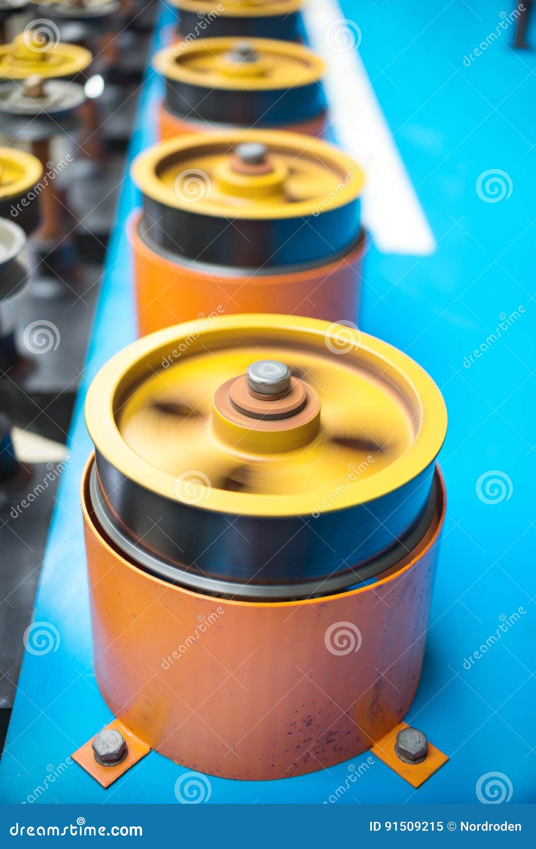 Rotating Rubberized Wheels of the Winding Machine. Stock Image - Image ...
